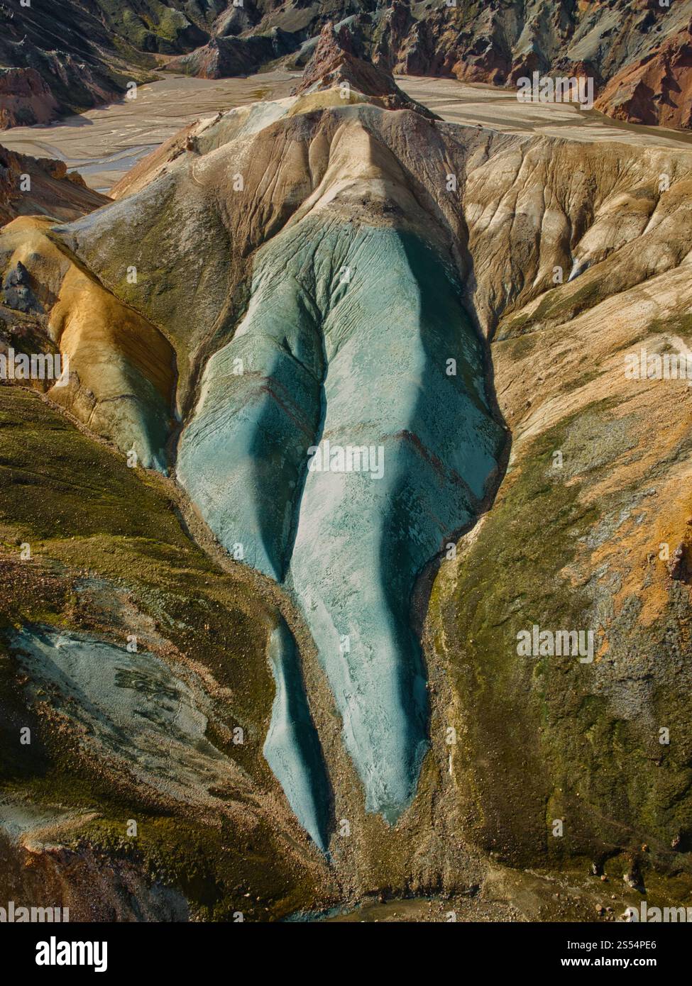 Aerial view of an emerald-colored mountain in Iceland’s Highlands. Its ...