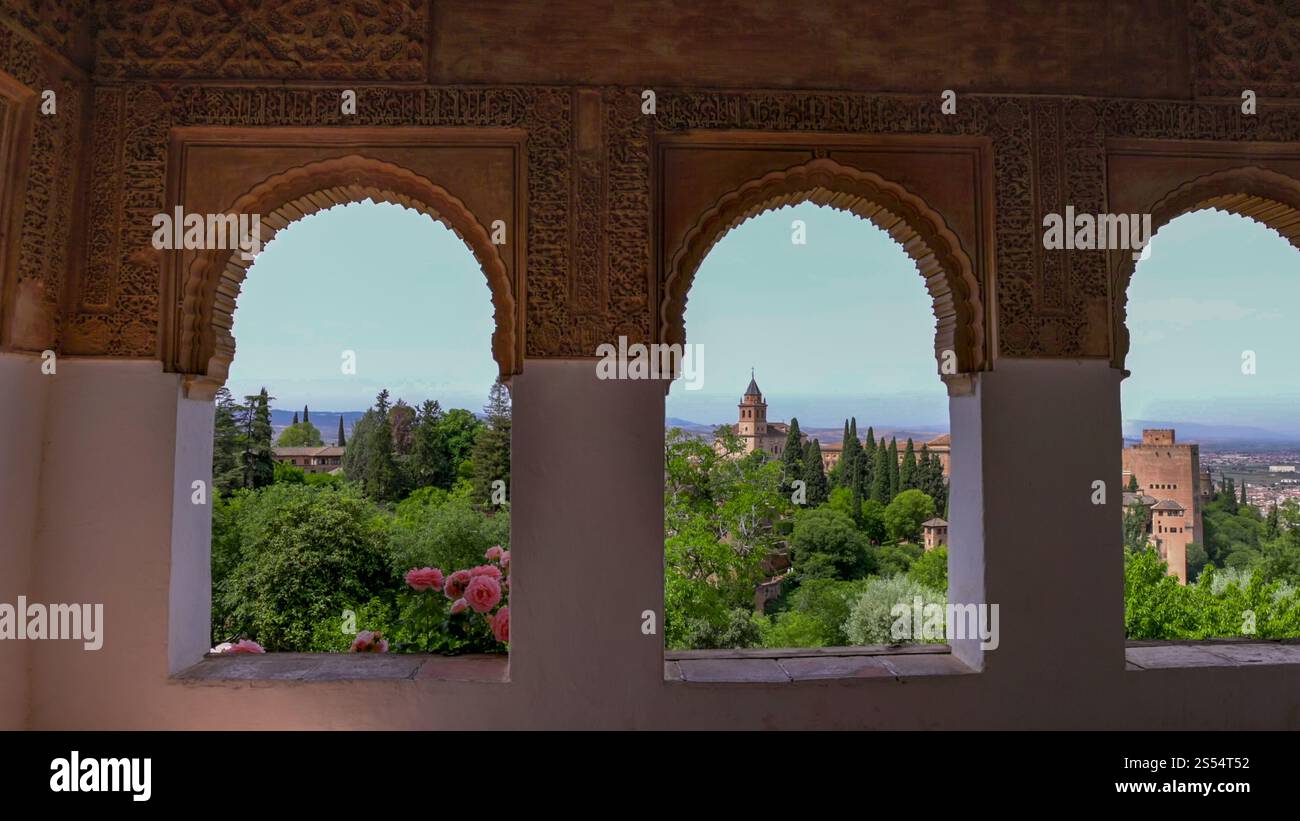 parador de granada framed by arches at the ancient palace-fortress of ...
