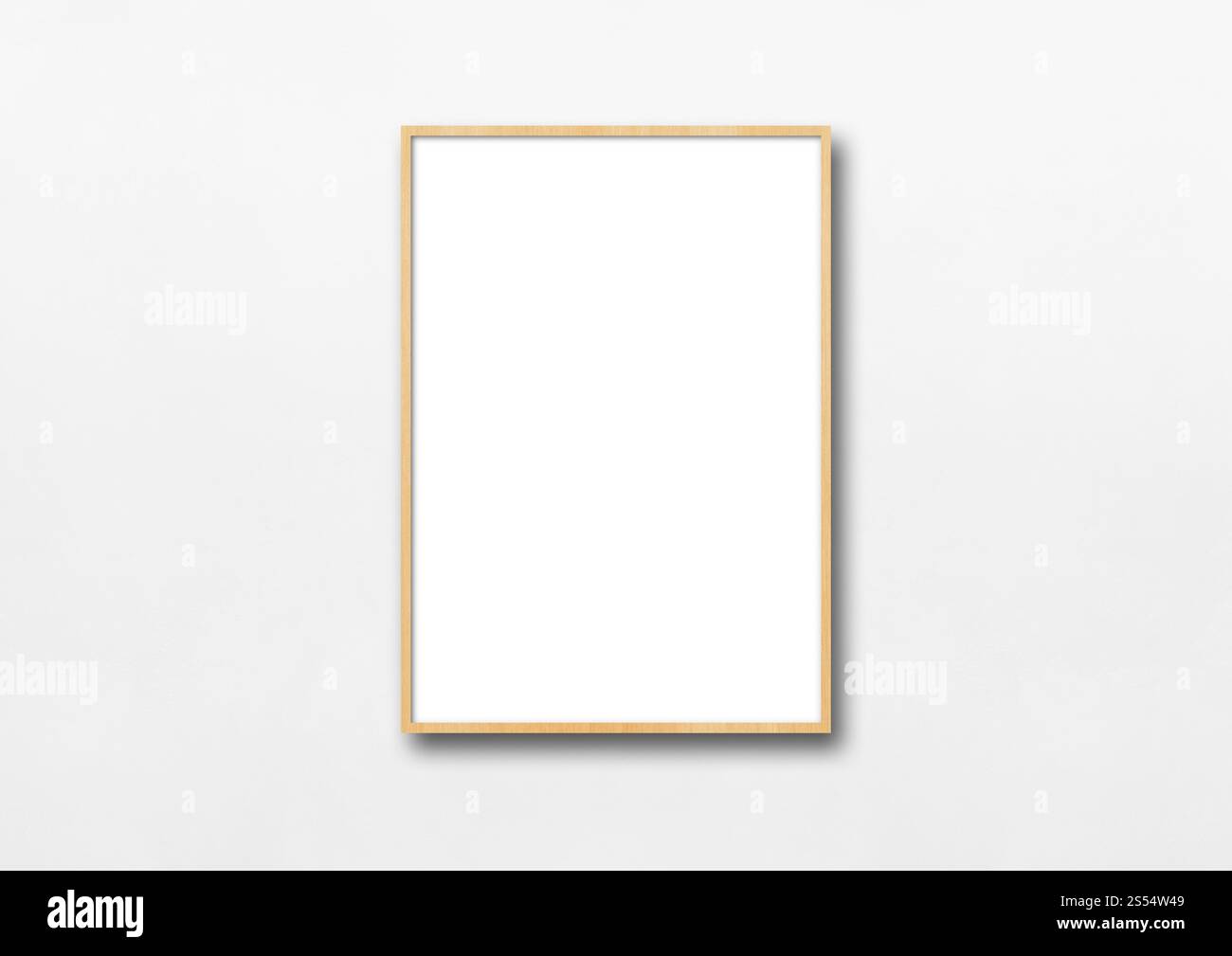 Wooden picture frame hanging on a white wall. Blank mockup template ...