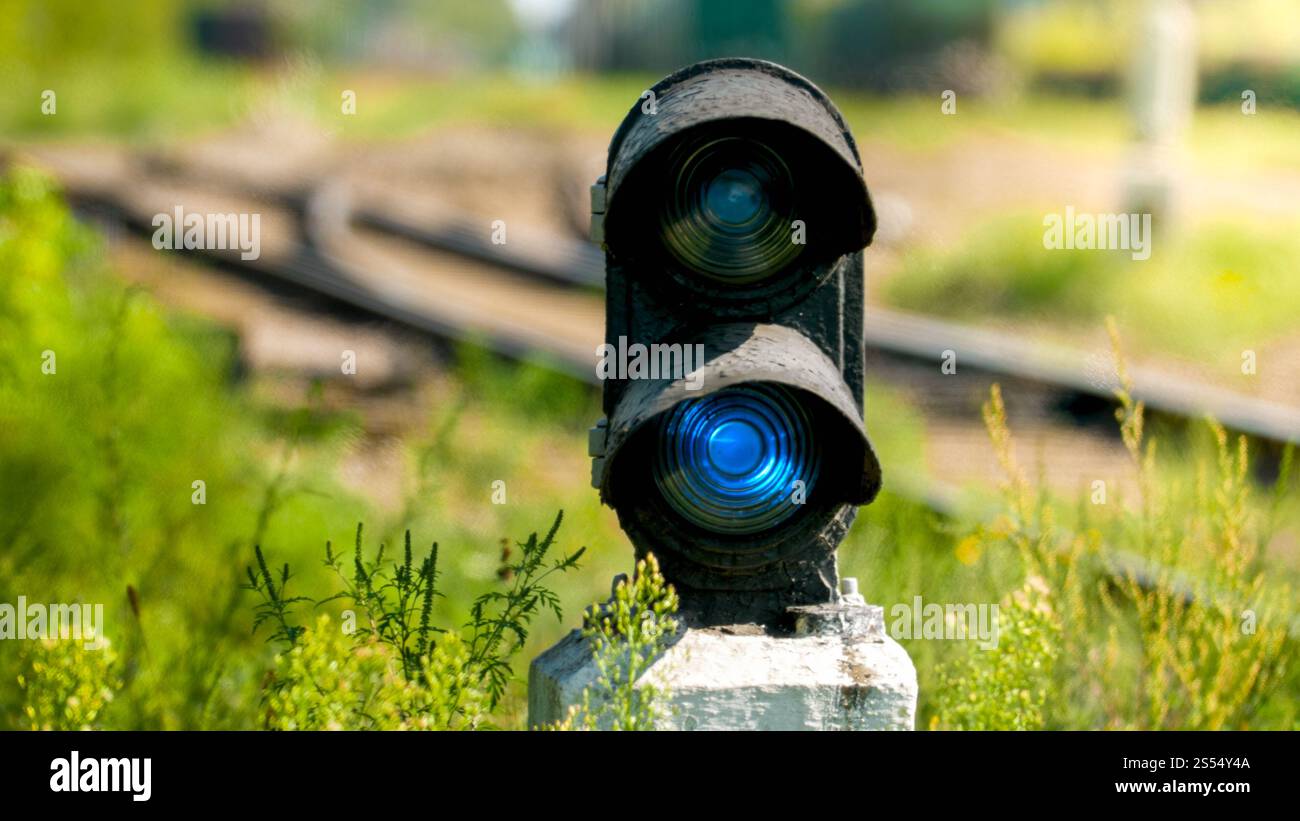 Image of blue traffic light or semaphor on the railroad. Photo of blue ...