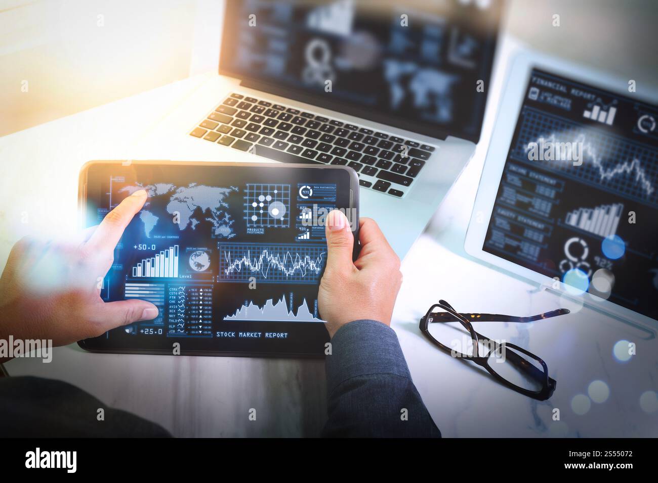 Investor analyzing stock market report and financial dashboard with ...