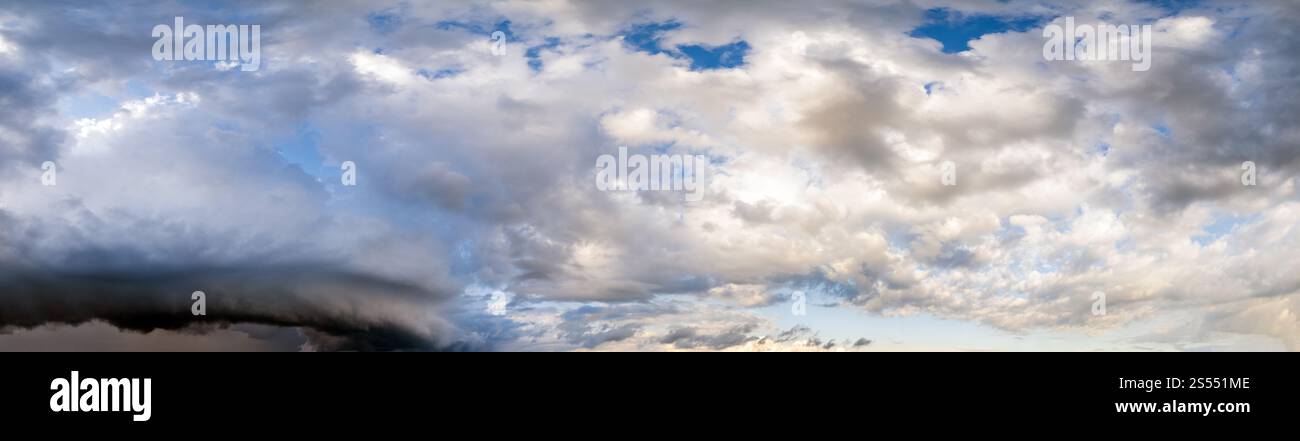 Dramatic cloudy sky with circular thunderstorm cloud in far. Natural ...