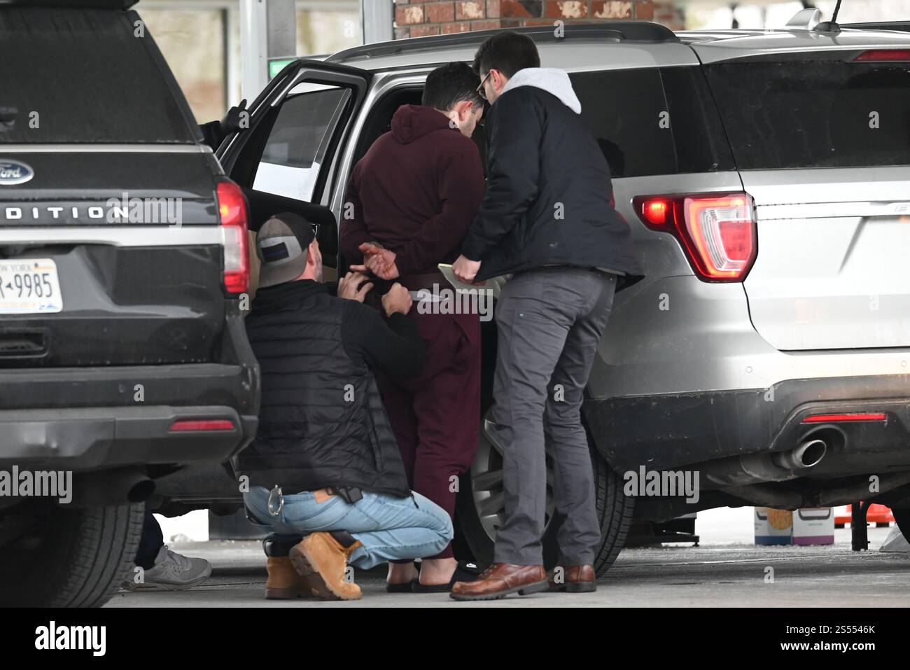 Man arrested federal agents hi-res stock photography and images - Alamy