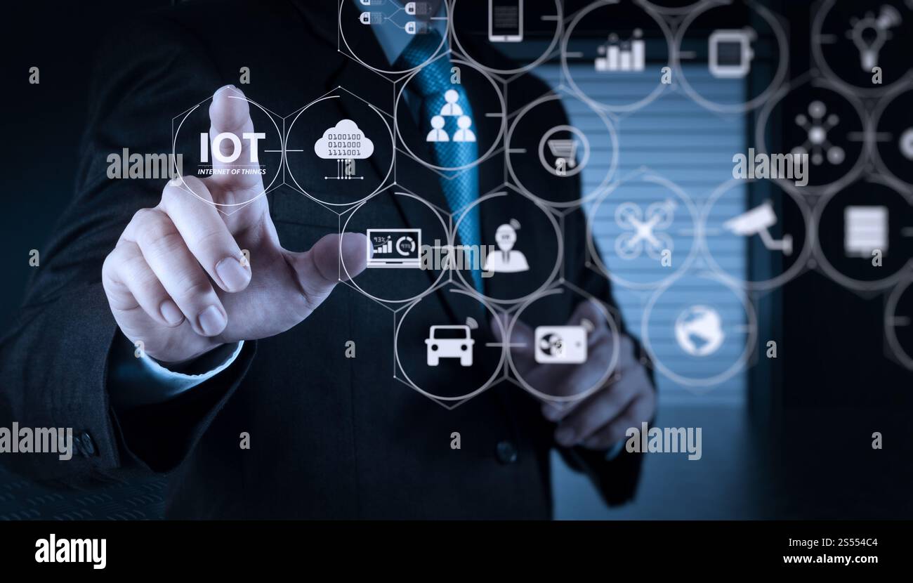 Internet of Things (IOT) technology with AR (Augmented Reality) on VR dashboard. businessman ...