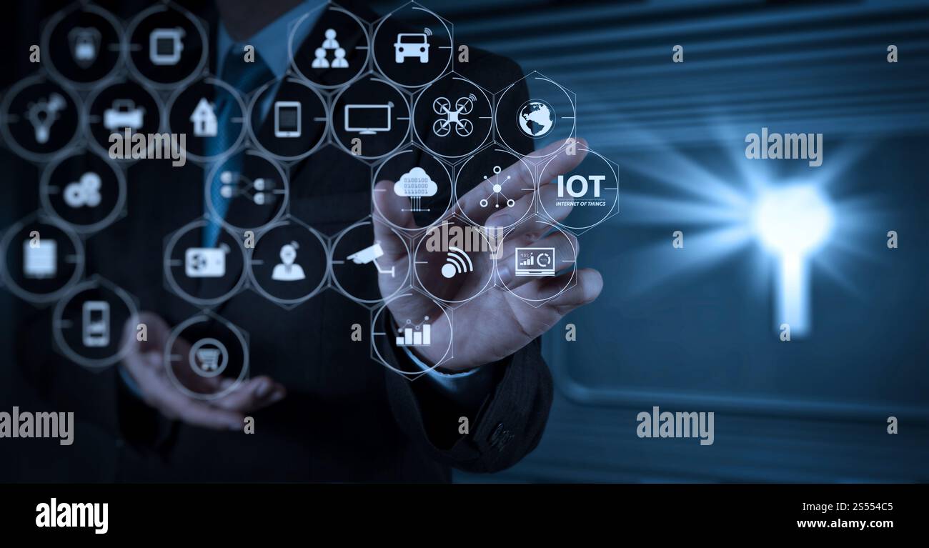 Internet of Things (IOT) technology with AR (Augmented Reality) on VR dashboard. businessman ...