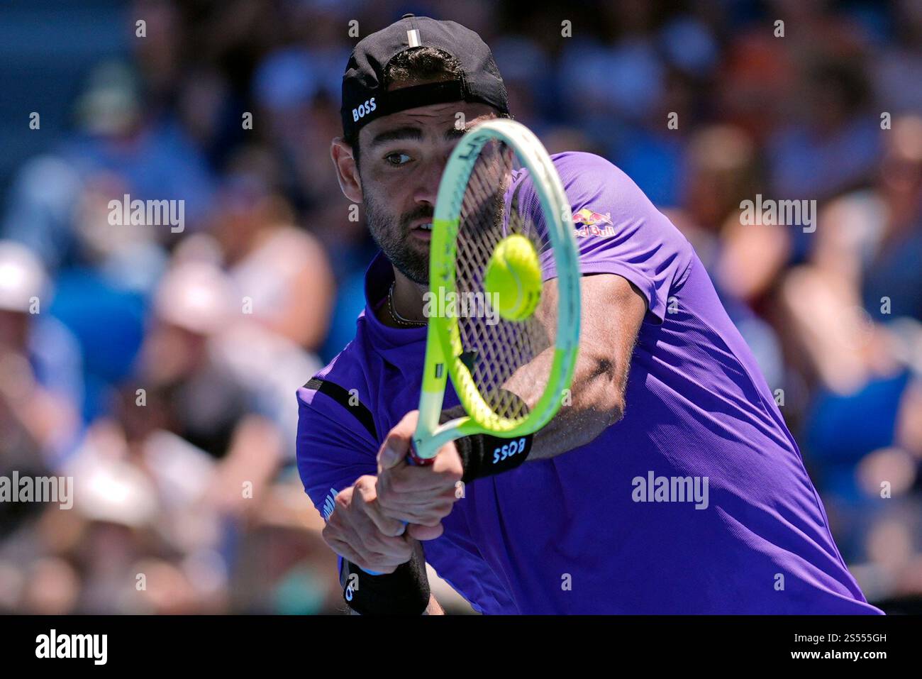 Matteo Berrettini of Italy plays a backhand return to Cameron Norrie of Britain during their ...