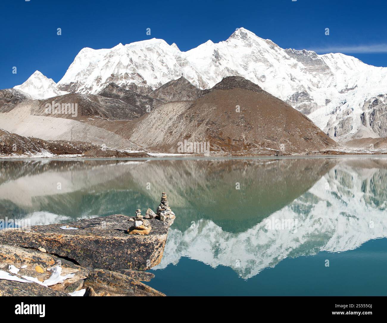 Mount Cho Oyu mirroring in lake, view of Mt Cho Oyu base camp vith ...