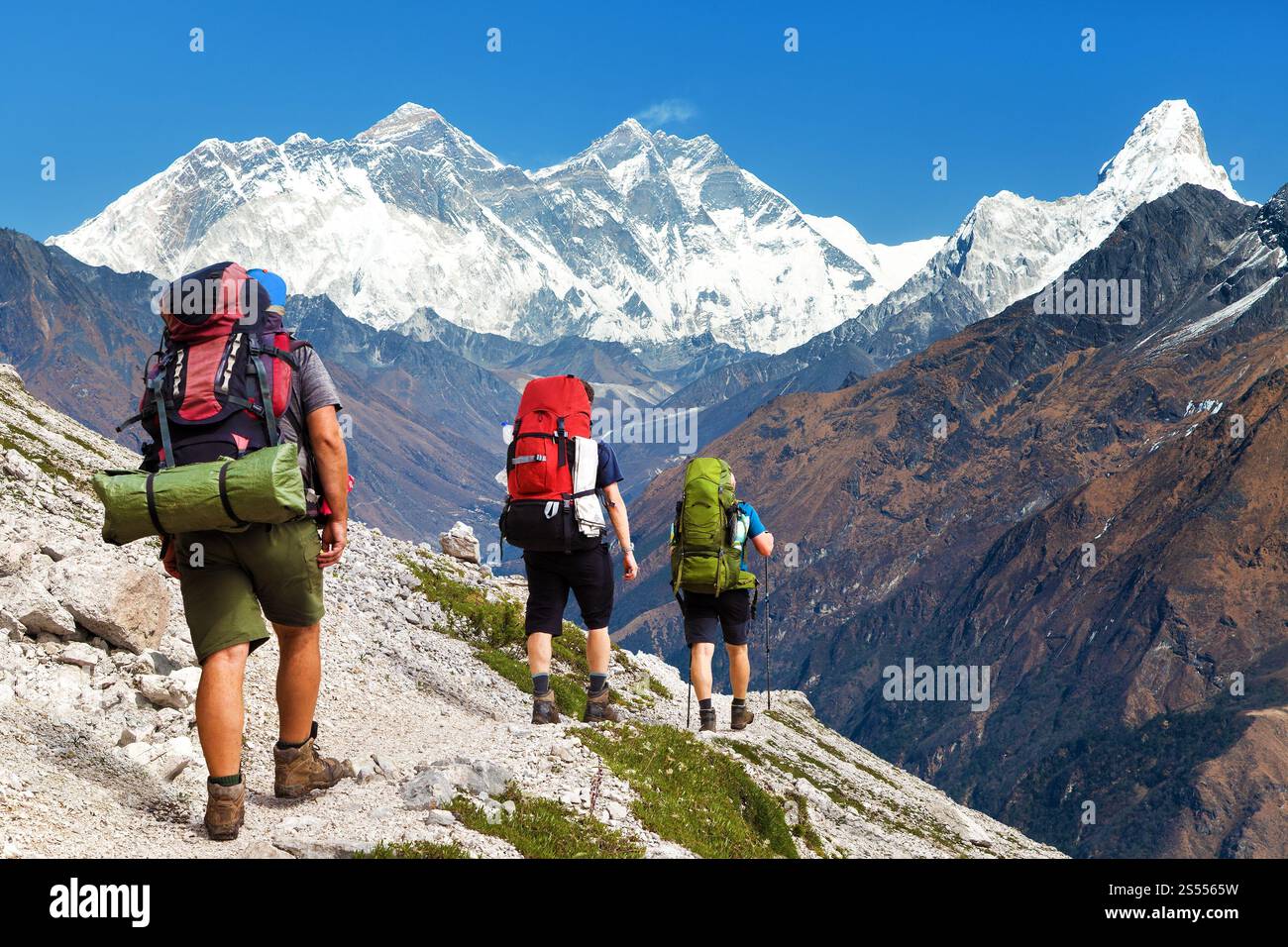 Mount Everest, Mt Ama Dablam, three hikers, way to Mt Everest base camp ...