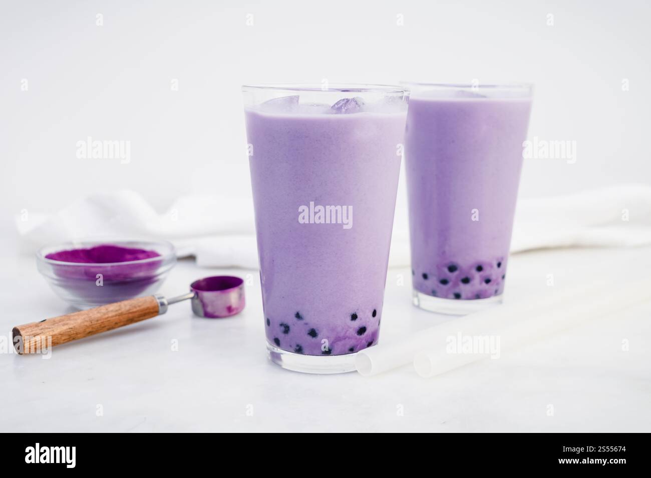 Two Glasses of Purple Sweet Potato Bubble Tea: Ube boba with ice cubes ...