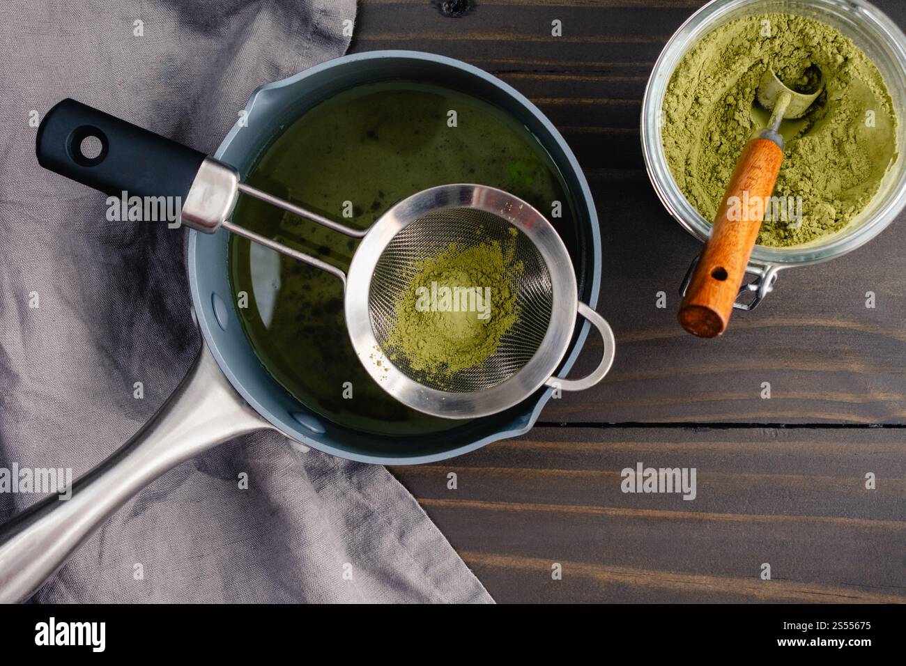 Sifting Green Tea Powder into Simple Syrup: Matcha powder being sifted ...