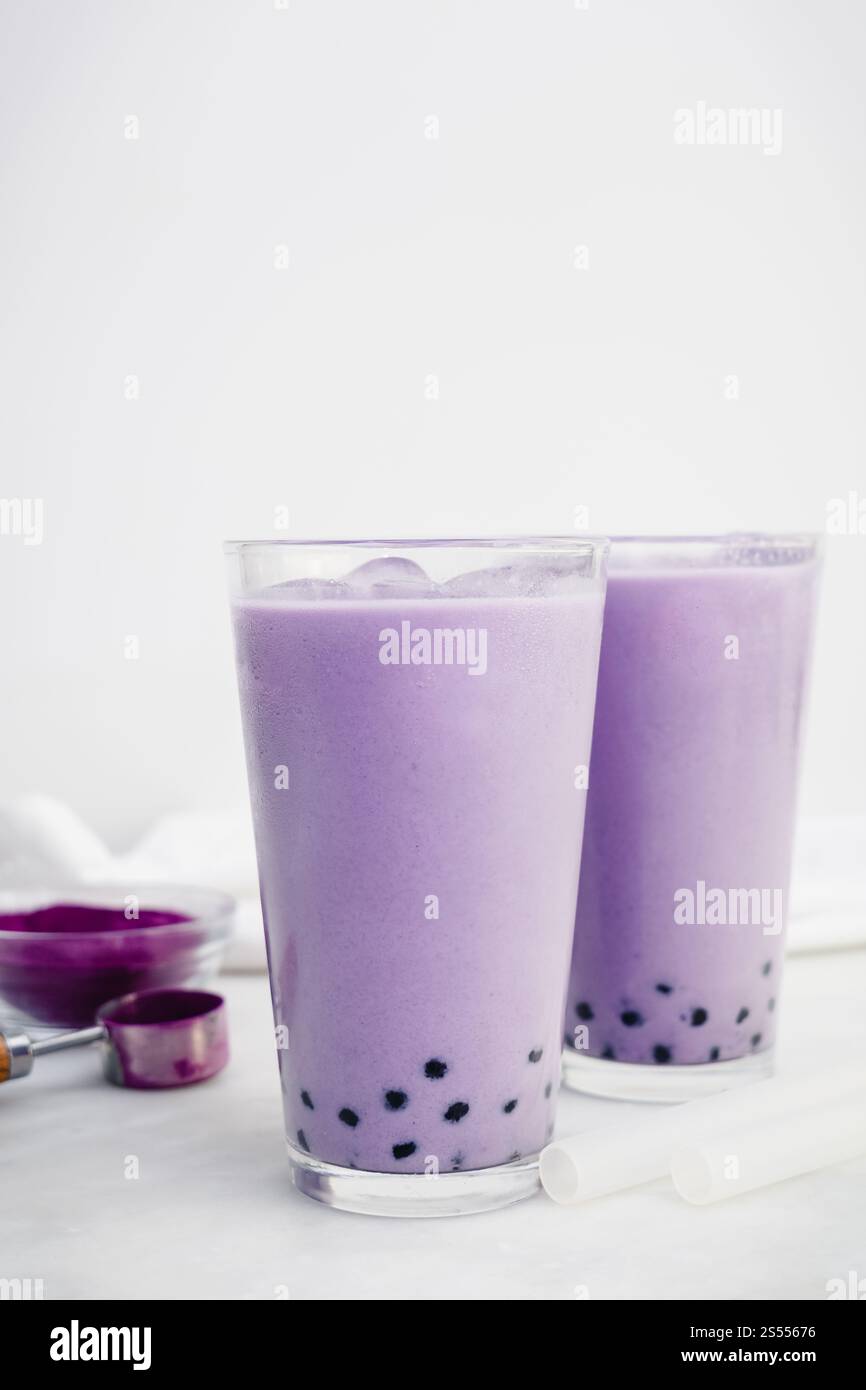Two Glasses of Purple Sweet Potato Bubble Tea: Ube boba with ice cubes ...