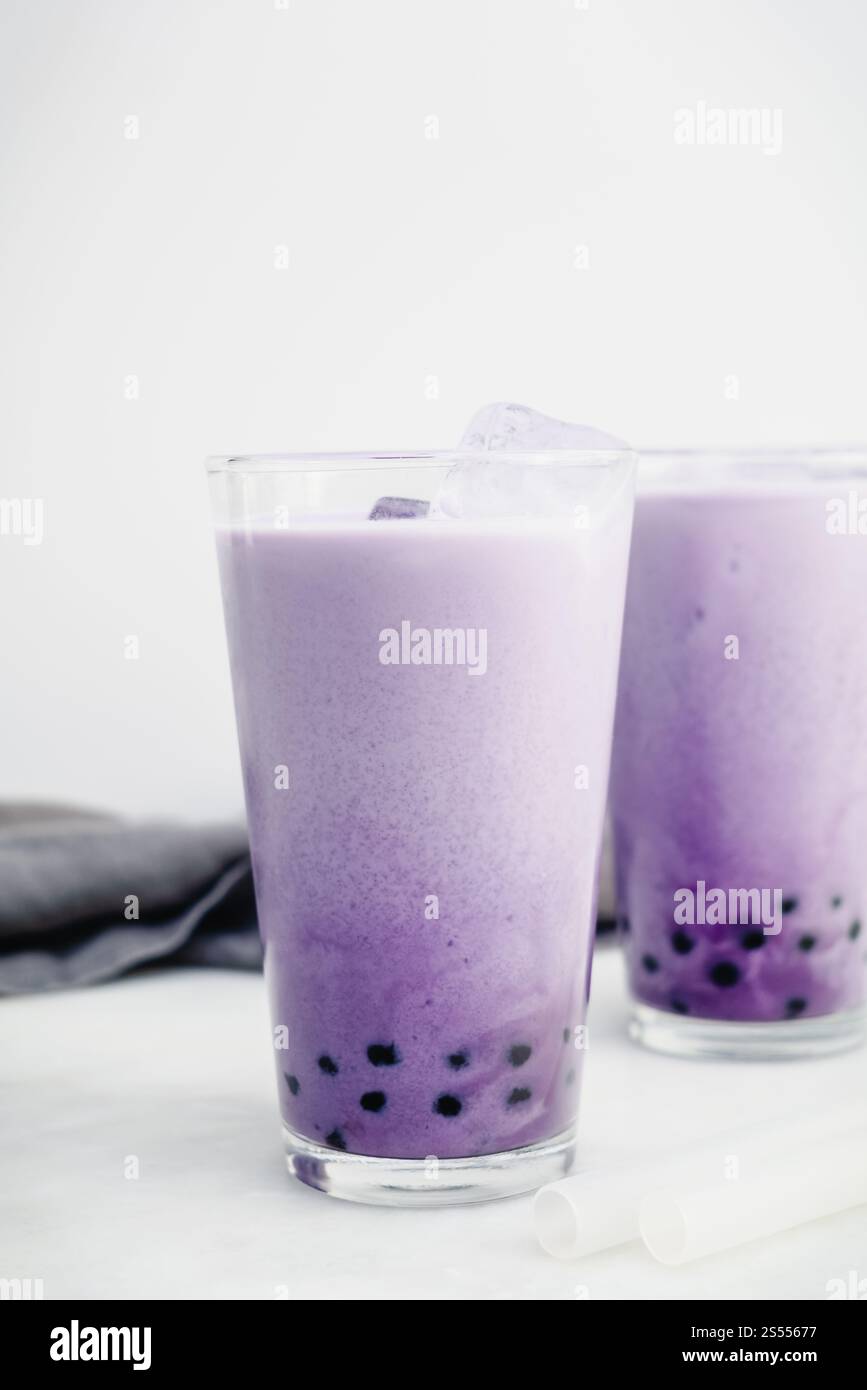Two Glasses of Purple Sweet Potato Bubble Tea: Ube boba with ice cubes ...