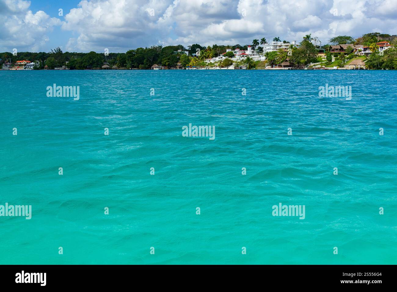 Blue water at Seven Colors Lake Bacalar, Mexico Stock Photo - Alamy