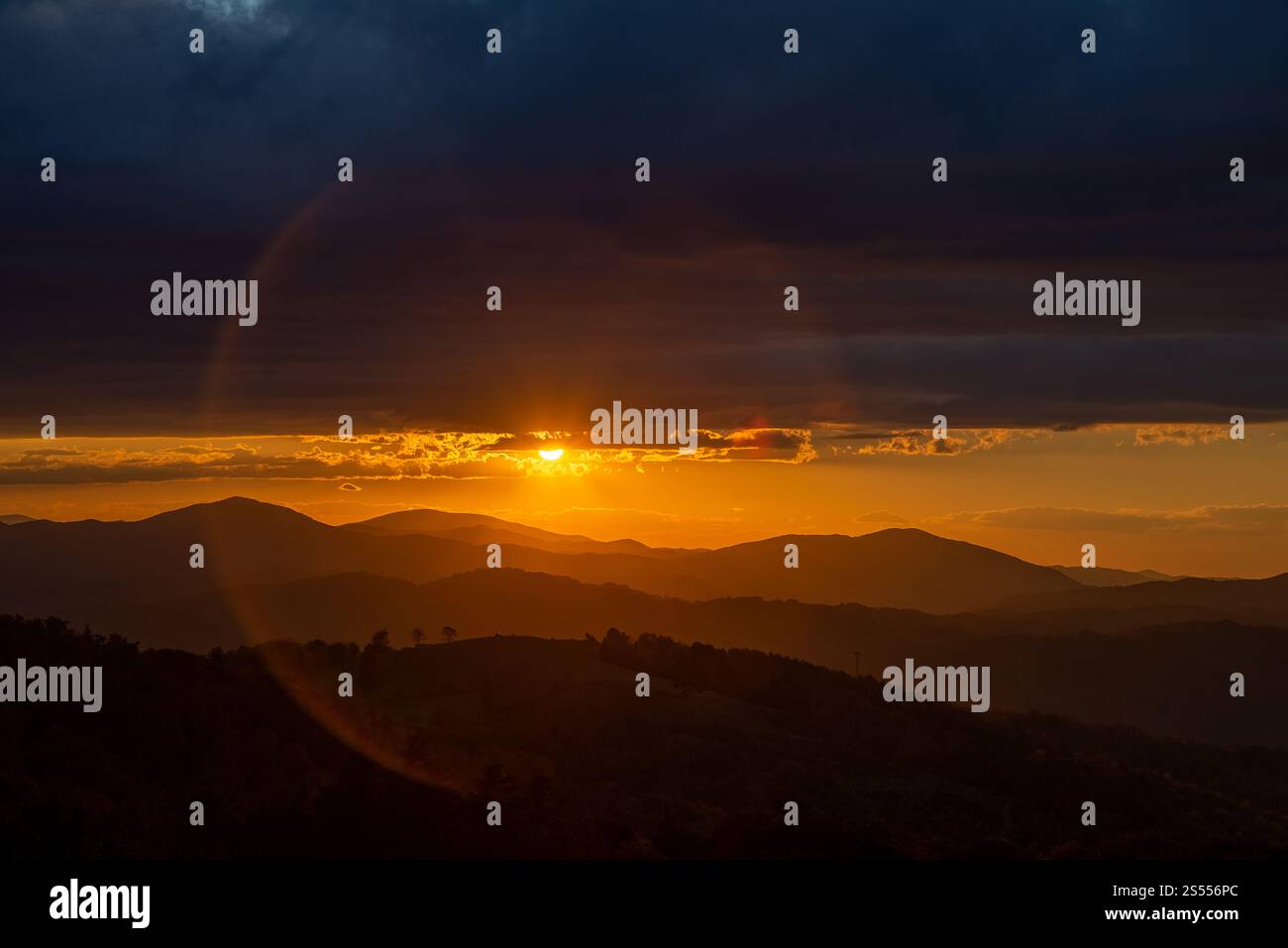 North Carolina Blue Ridge Mountains sunset with lots of clouds and sun ...