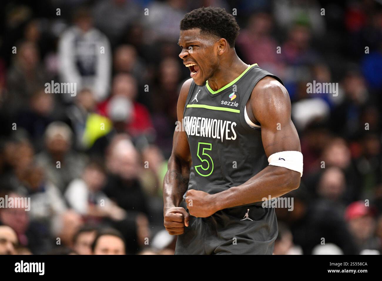 Minnesota Timberwolves guard Anthony Edwards runs dowcourt after making ...