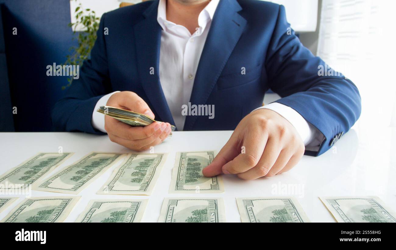 Venal male official counting hi-res stock photography and images - Alamy