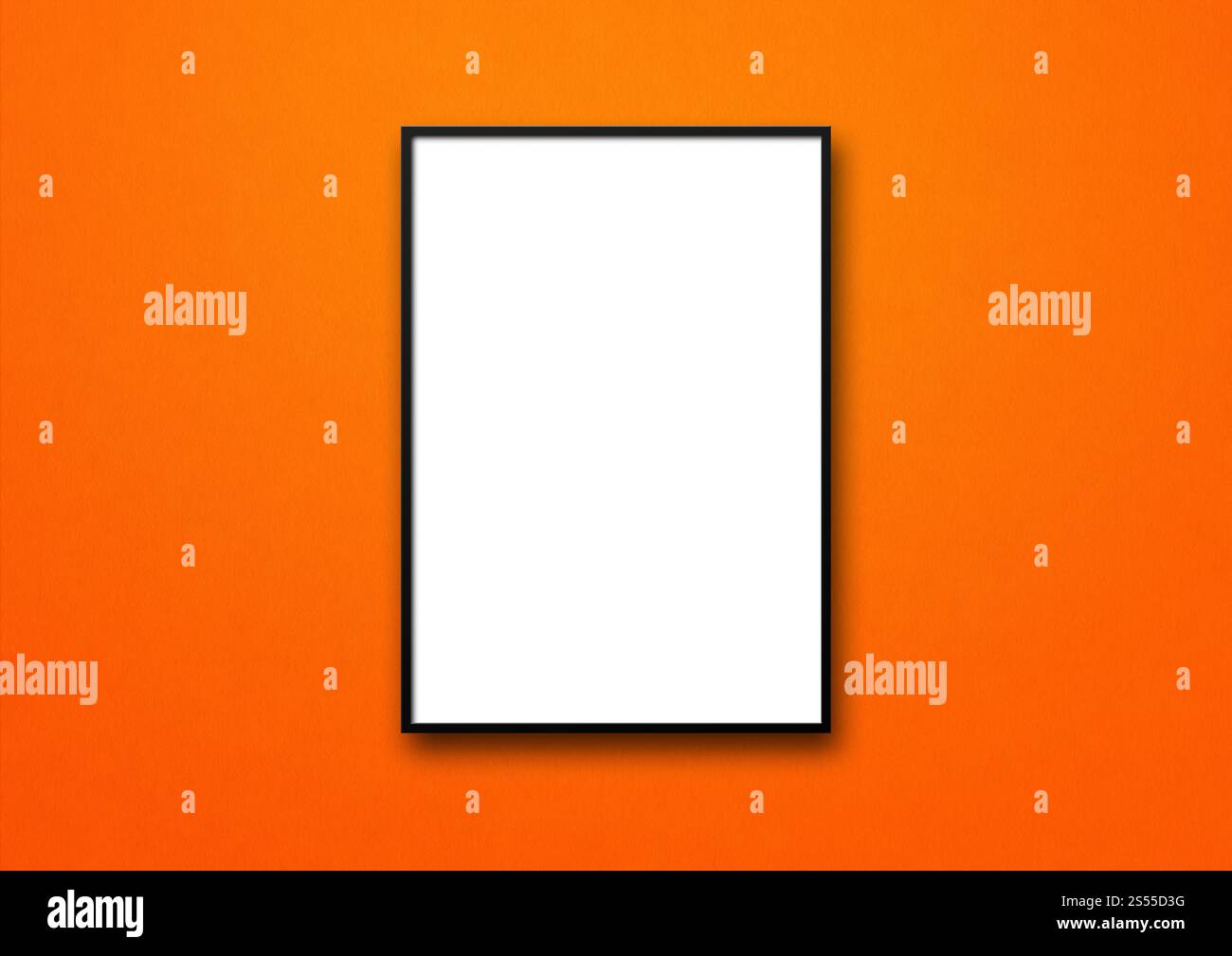 Black picture frame hanging on an orange wall. Blank mockup template ...