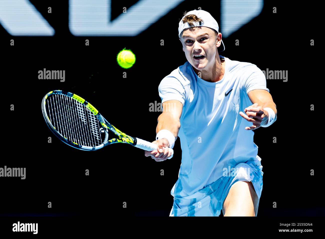 MELBOURNE, VIC - JANUARY 14: Holger Rune of Denmark in action during ...