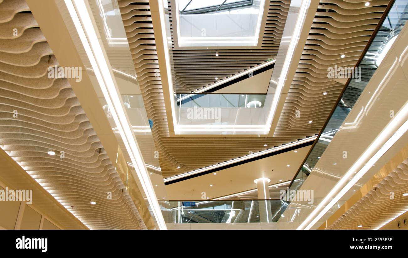 Interior of modern office building with long corridors and balconies ...