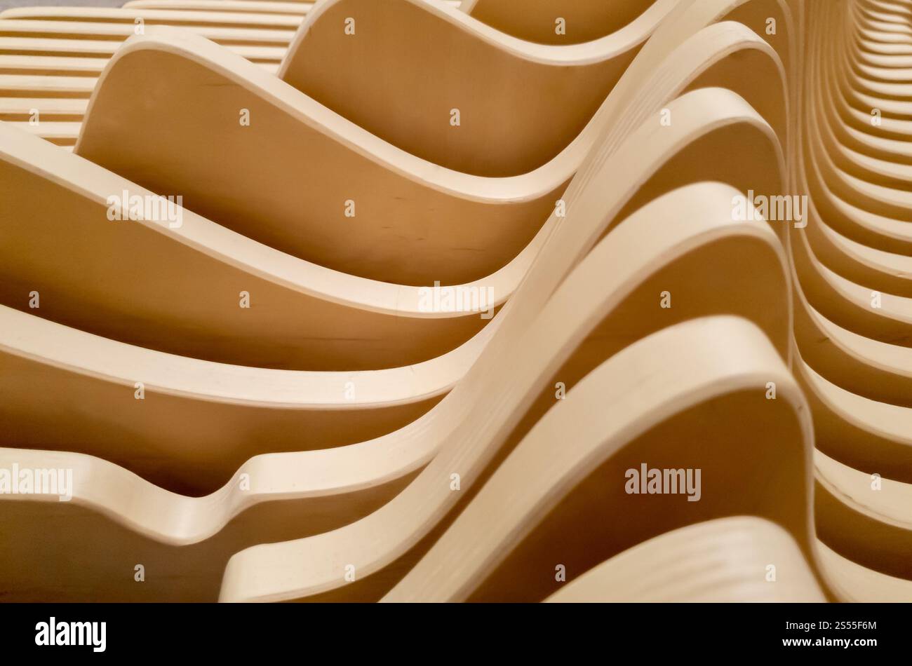 Abstract background of wooden curved geometry shapes. Closeup abstract ...