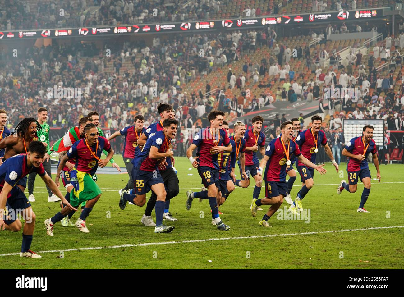 Jeddah, Saudi Arabia. 13th Jan, 2025. Barcelona's players celebrate ...