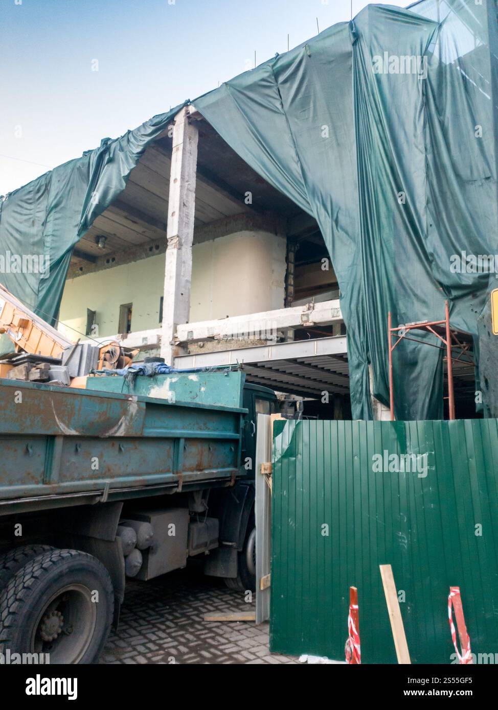 Construction truck working on the building site. Big construction truck ...