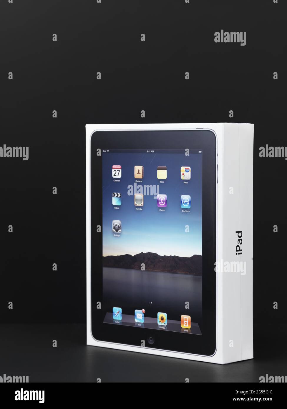 Apple iPad product packaging boxed and wrapped in plastic. Isolated on ...