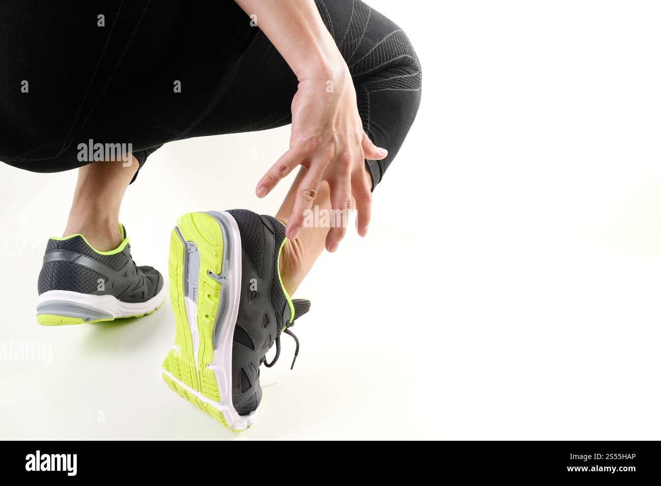 Runner sportsman holding ankle in pain with Broken twisted joint running sport injury and ...