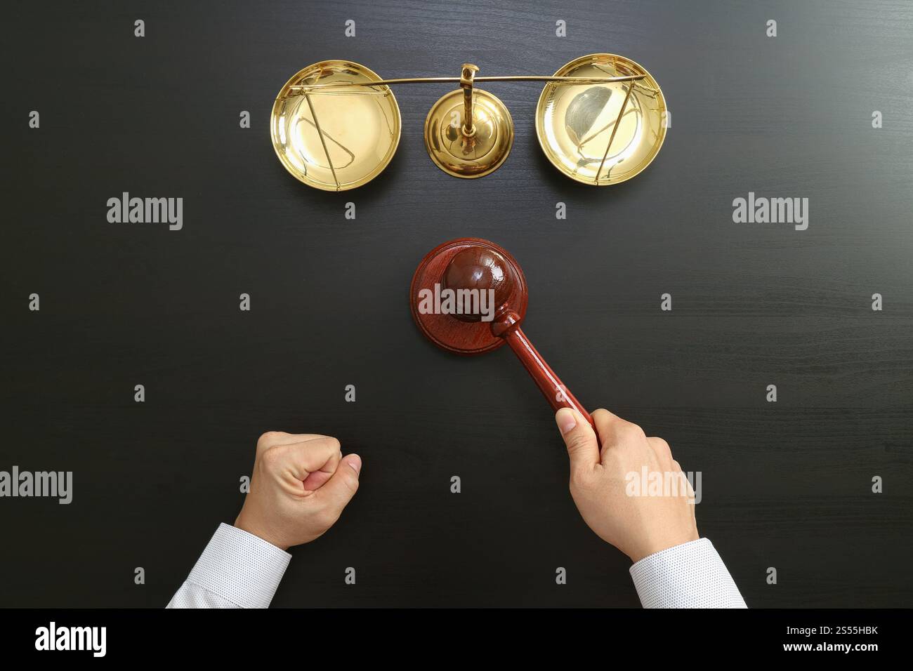 justice and law concept.Top view of Male judge hand in a courtroom with ...