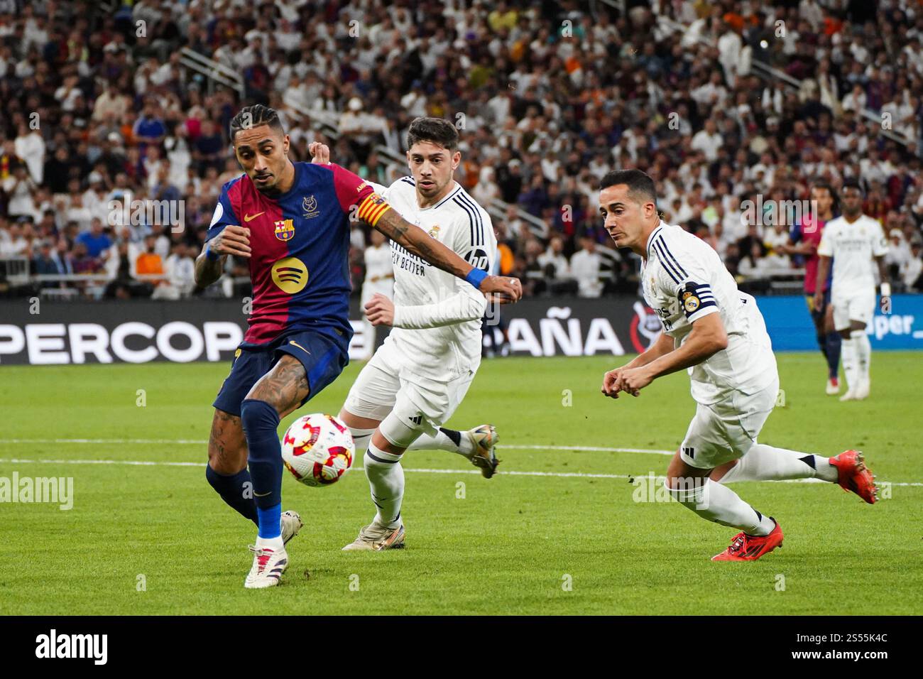 Barcelona's Brazilian player Rafael Alc‚ntara do Nascimento known as Raphinha (L) seen in action ...
