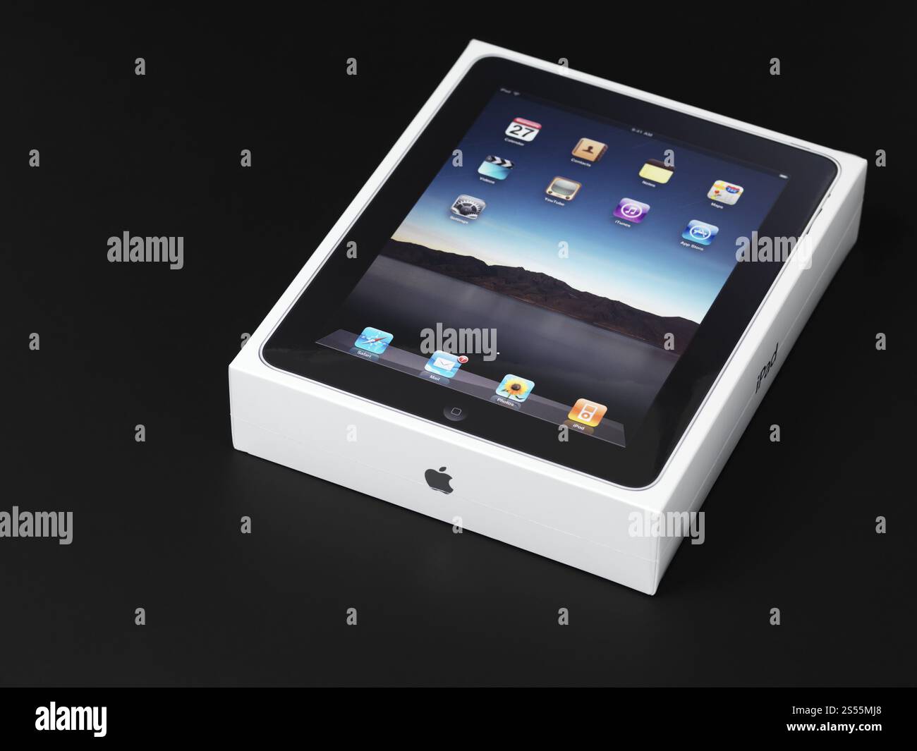 Apple iPad product packaging boxed and wrapped in plastic. Isolated on ...