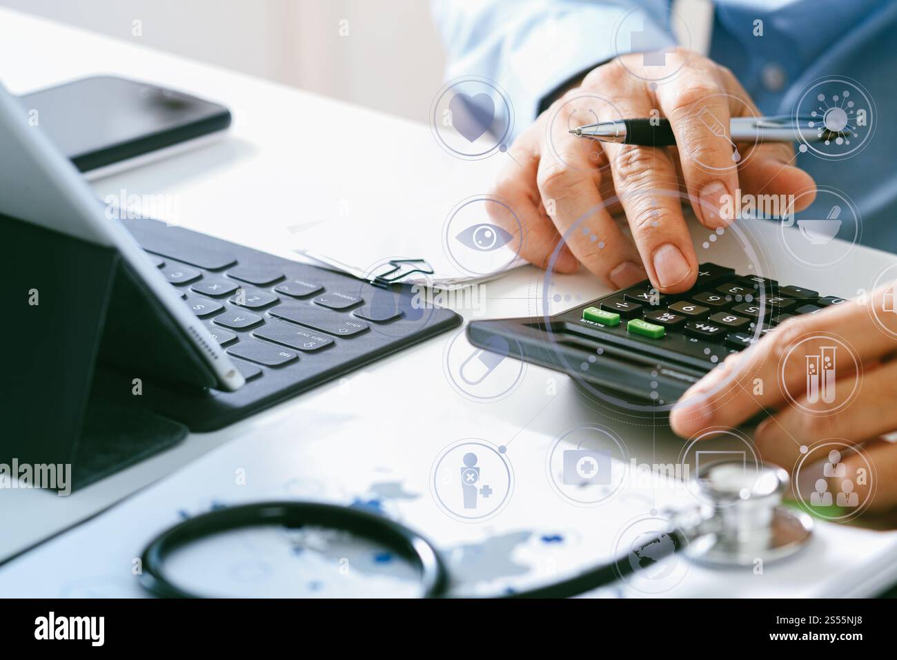 Healthcare costs and fees concept.Hand of smart doctor used a ...