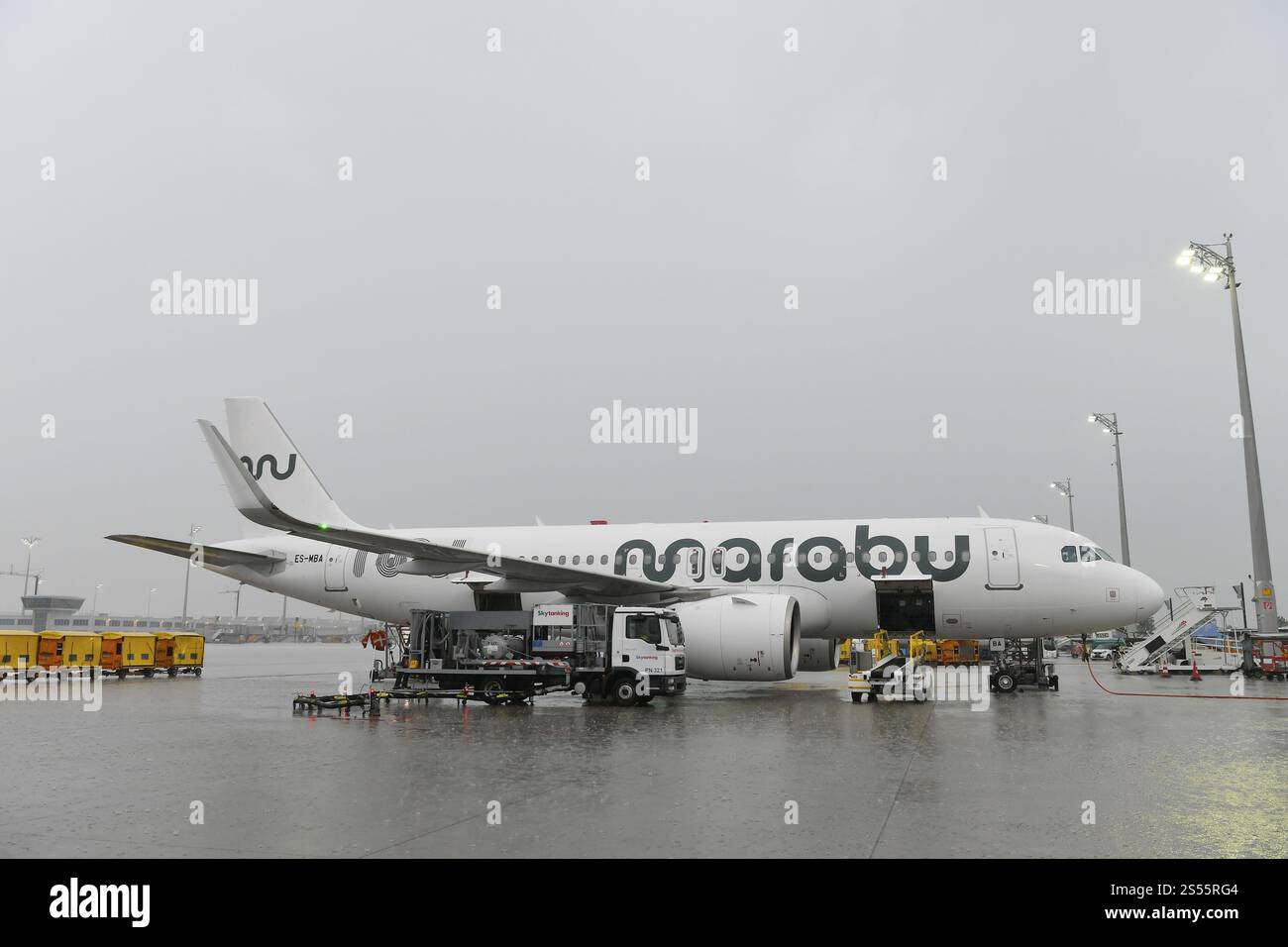 Marabou Stork Airbus A320 at check-in position during heavy rain ...