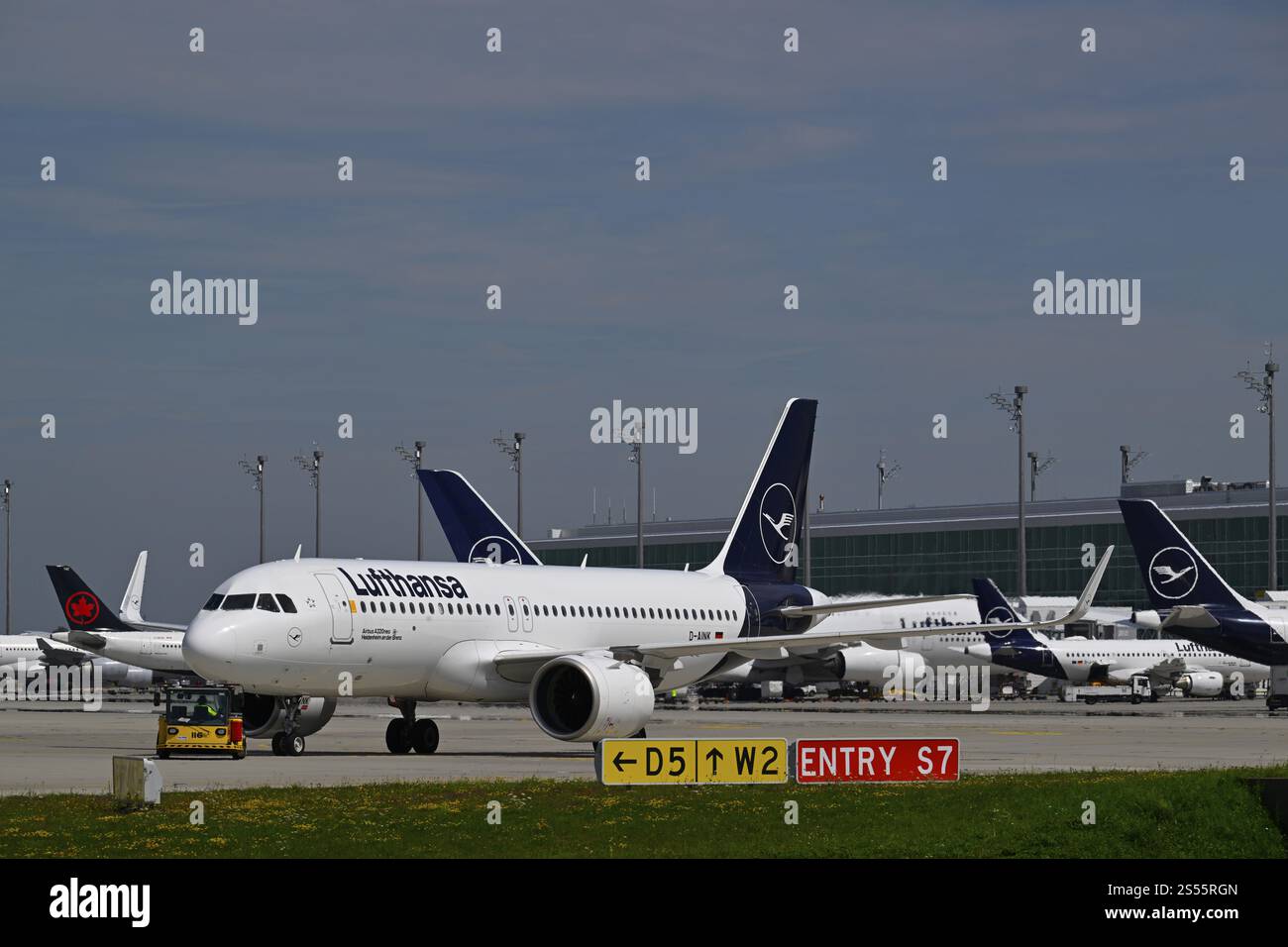 Lufthansa Airbus A320 Neo towing with towing vehicle in front of ...