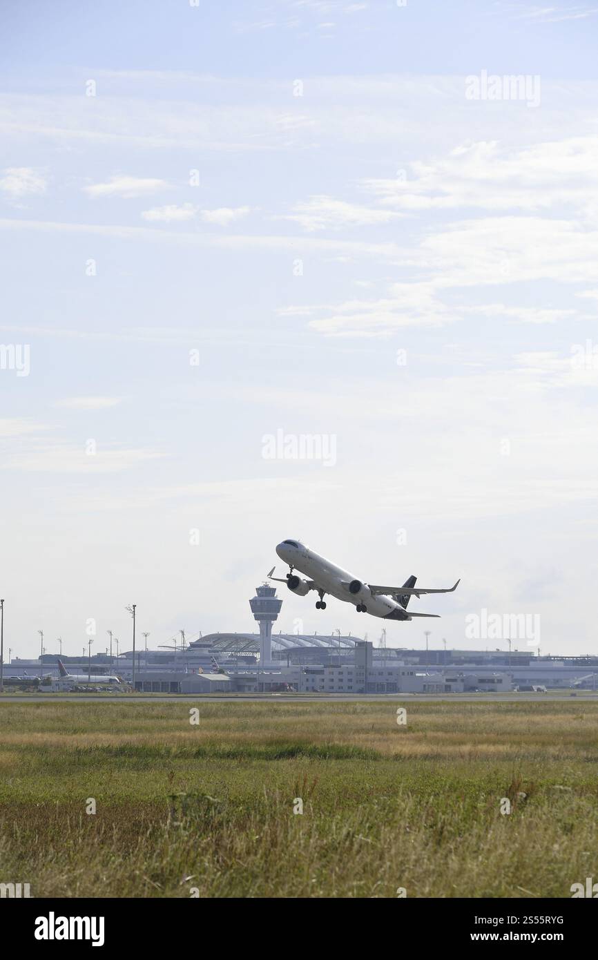 Lufthansa A321neo taking off on Runway North with control tower and ...