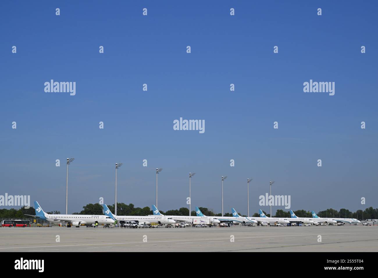 Air Dolomiti Embraer E195LR line up at check-in position Apron 2 East ...