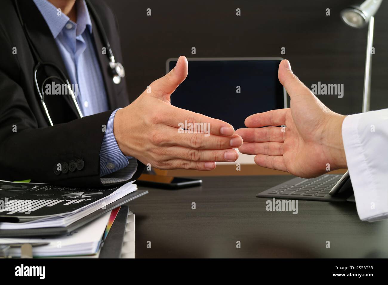 Medical and health care concept,Doctor and patient shaking hands in ...