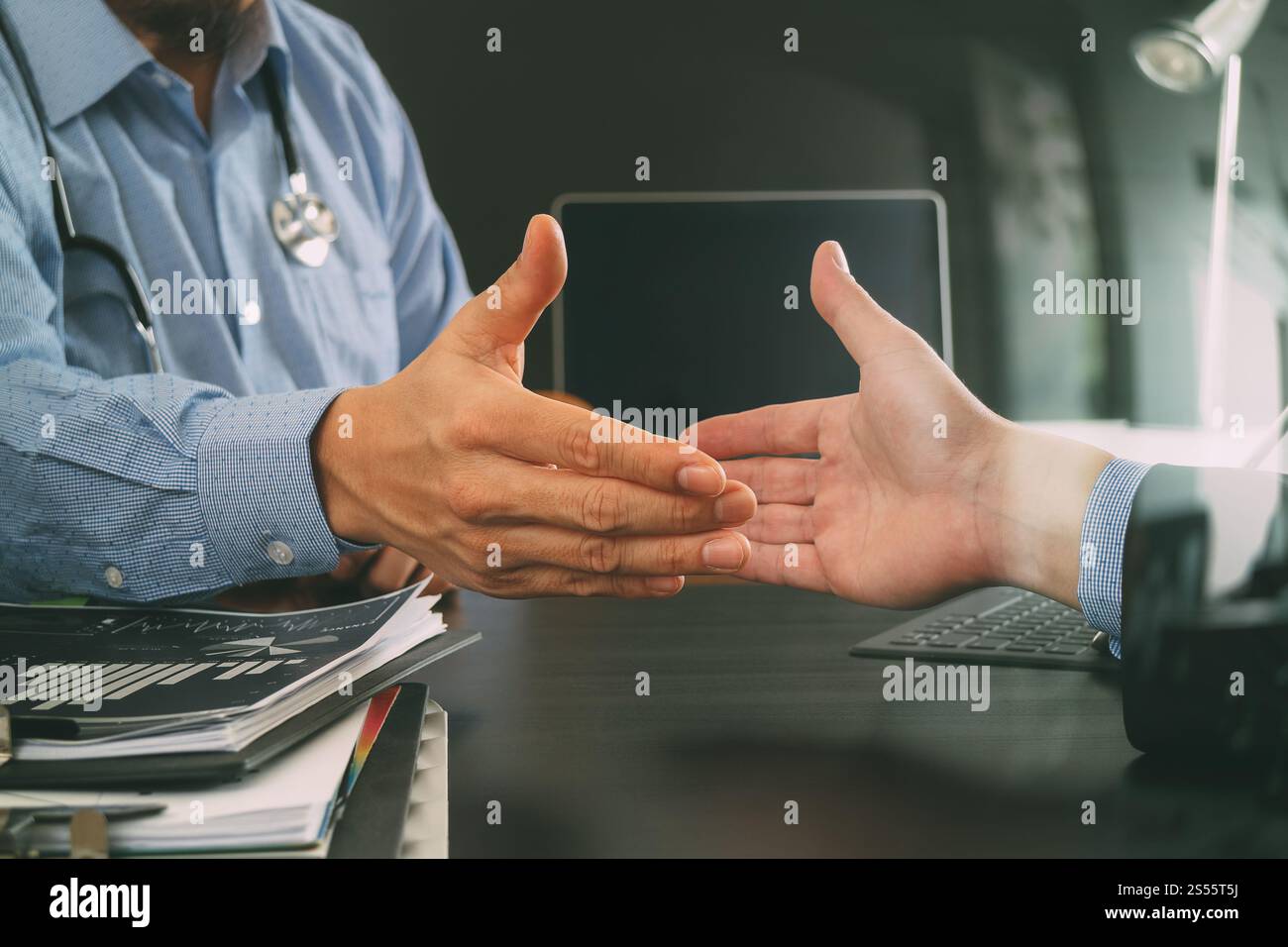 Medical and health care concept,Doctor and patient shaking hands in ...