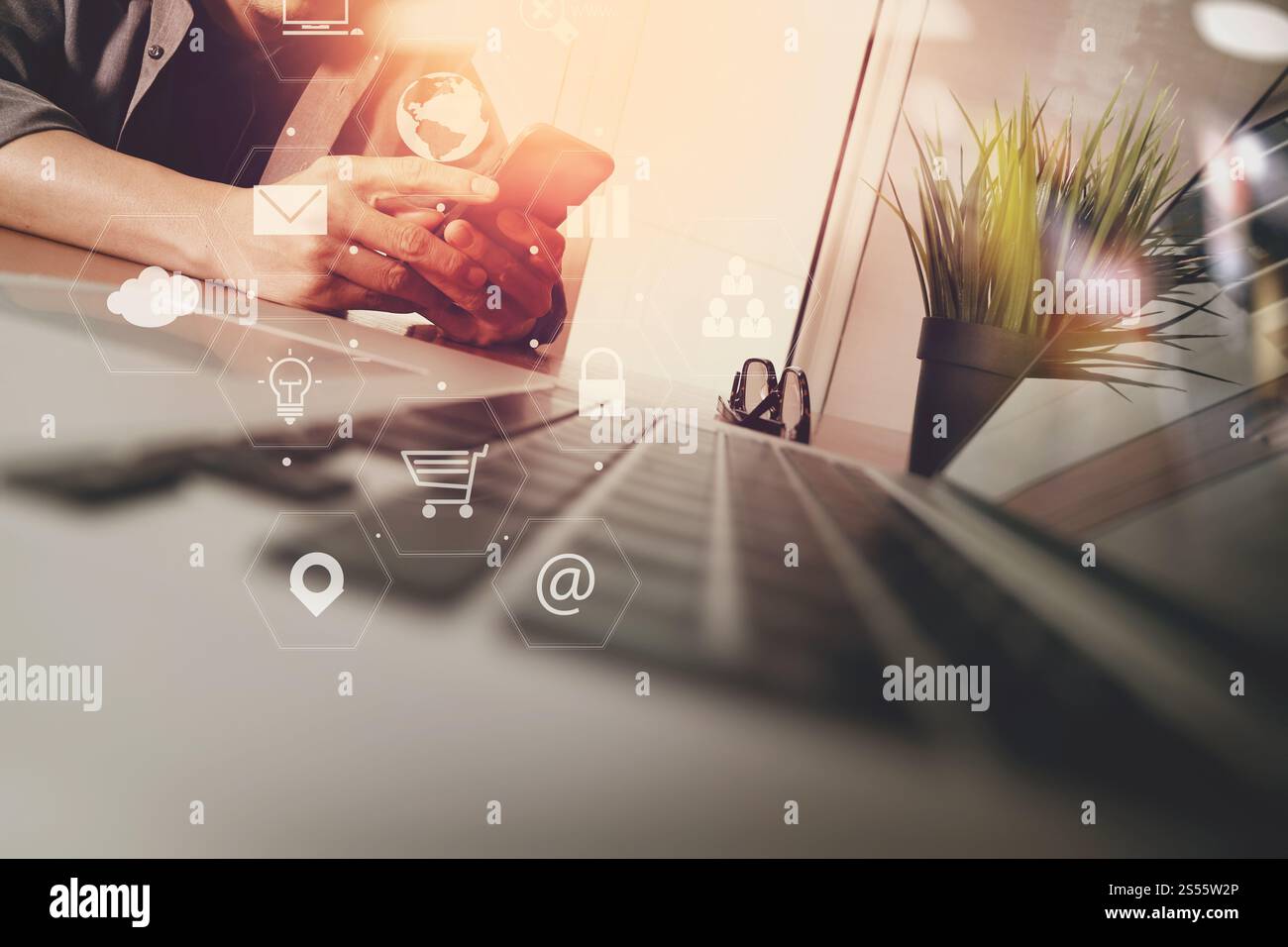 creative working with mobile phone and digital tablet and laptop ...
