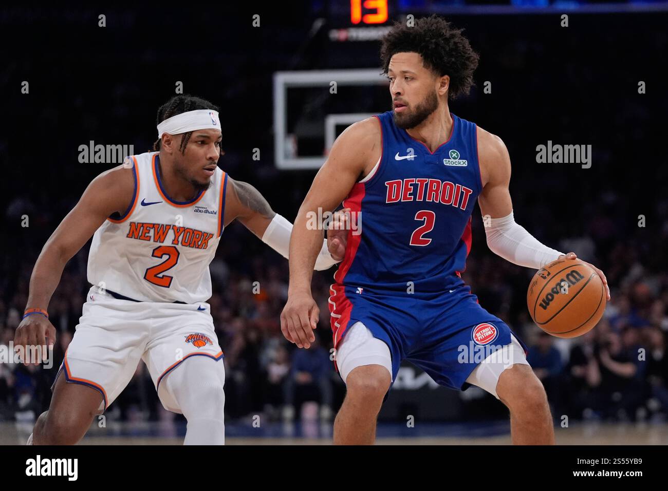 New York Knicks' Miles McBride (2) defends Detroit Pistons' Cade ...