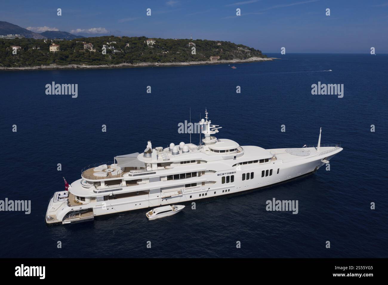 Aerial view 86 metre long motor yacht ECSTSEA at anchor off the ...