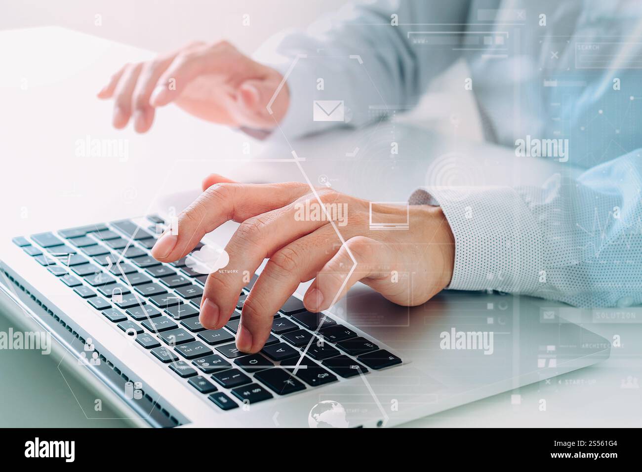 close up of businessman typing keyboard with laptop computer on white ...