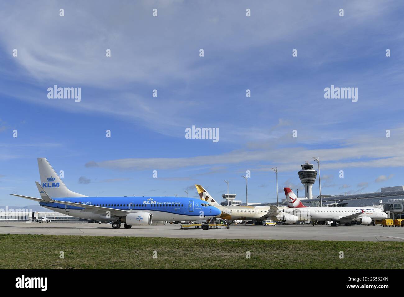KLM, Boeing, B737 being towed by towing vehicle in front of Terminal 1 ...