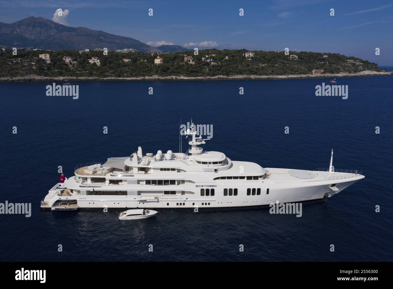 Aerial view 86 metre long motor yacht ECSTSEA at anchor off the ...