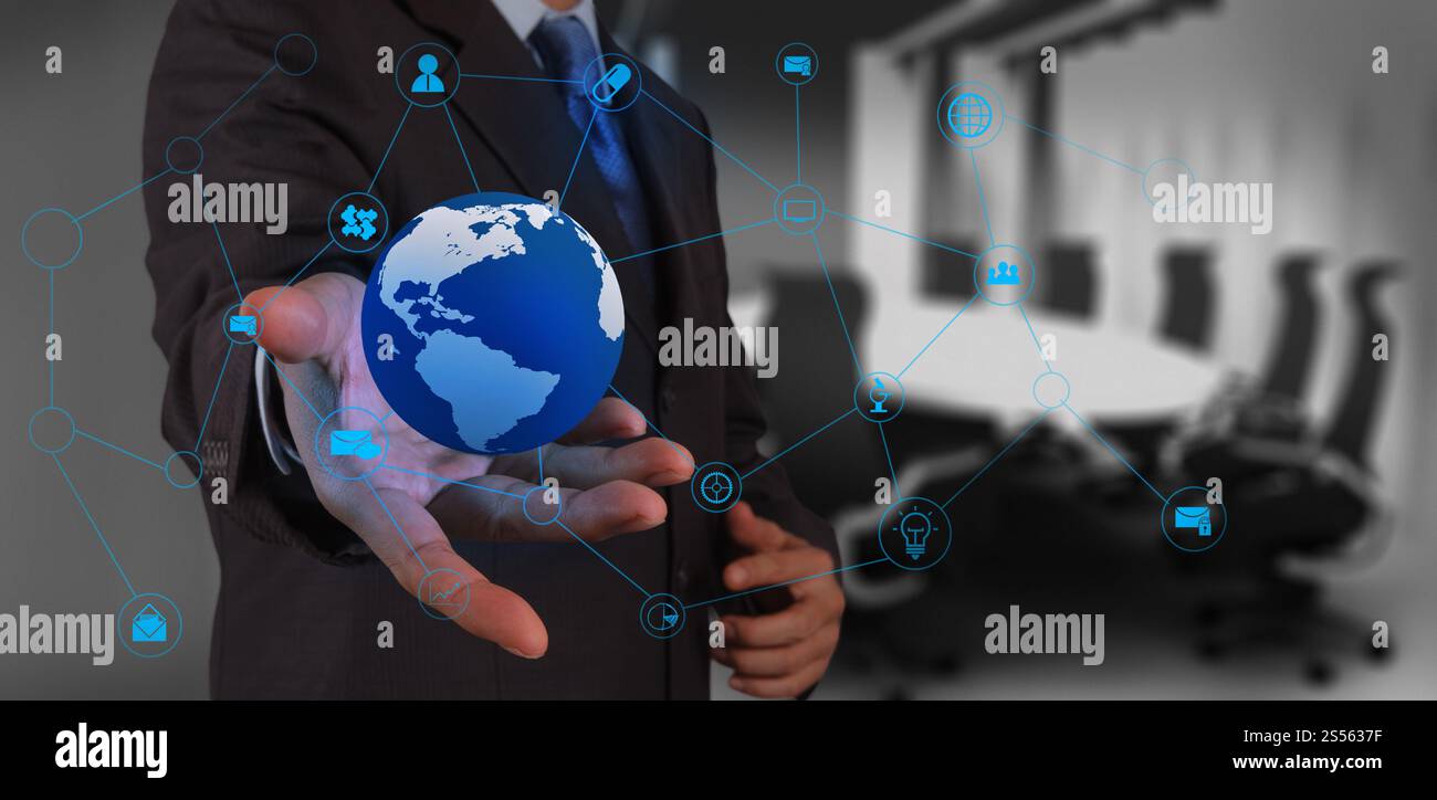 businessman hand working with new modern computer show the earth social ...