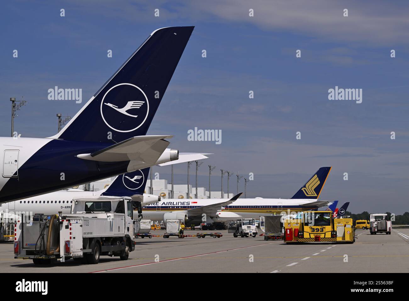 Various Lufthansa, Singapore Airlines aircraft at check-in position in ...