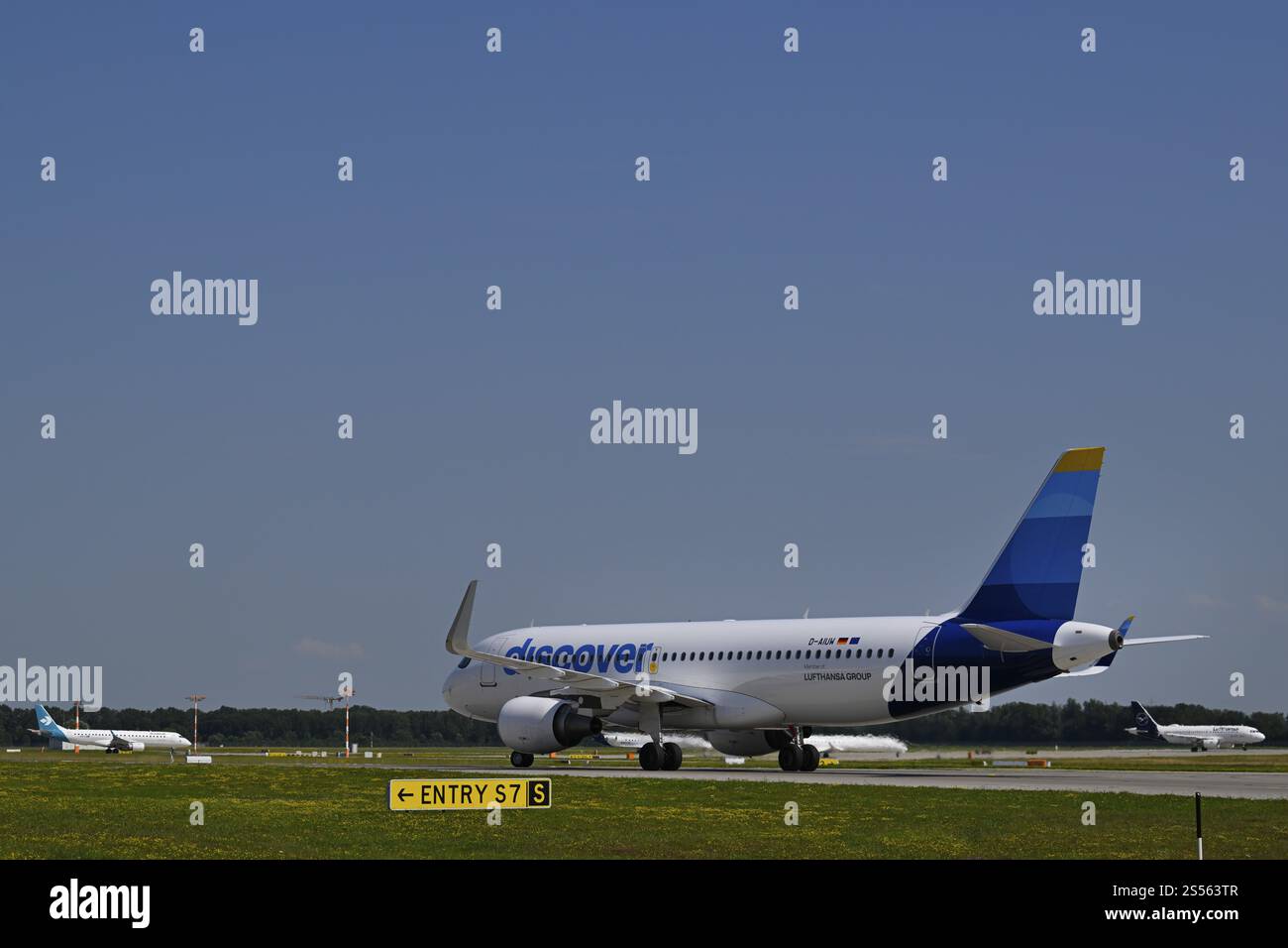 Discover and Air Dolomiti aircraft in perch position for take-off ...