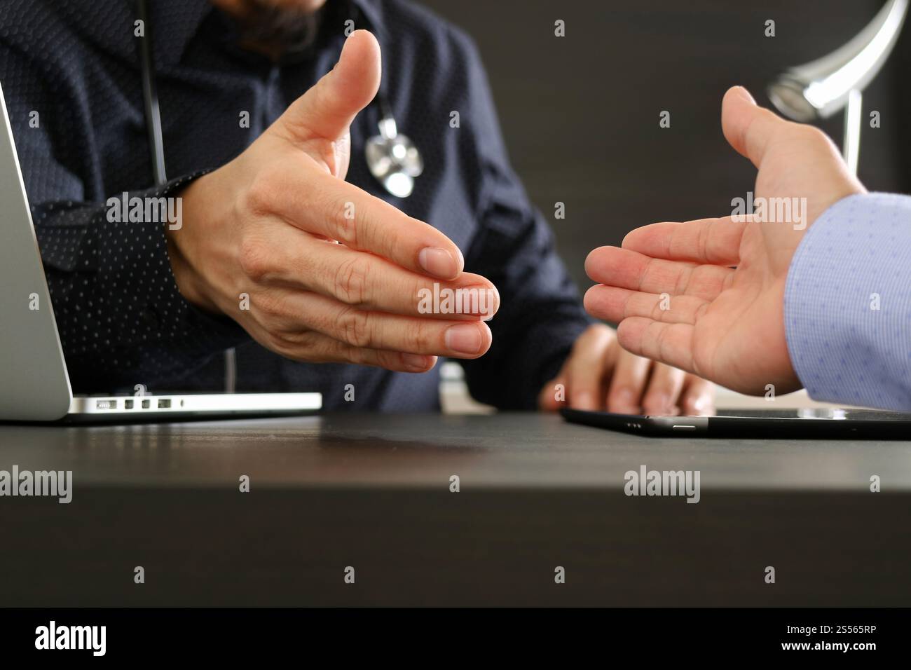 Medical and health care concept,Doctor and patient shaking hands in ...