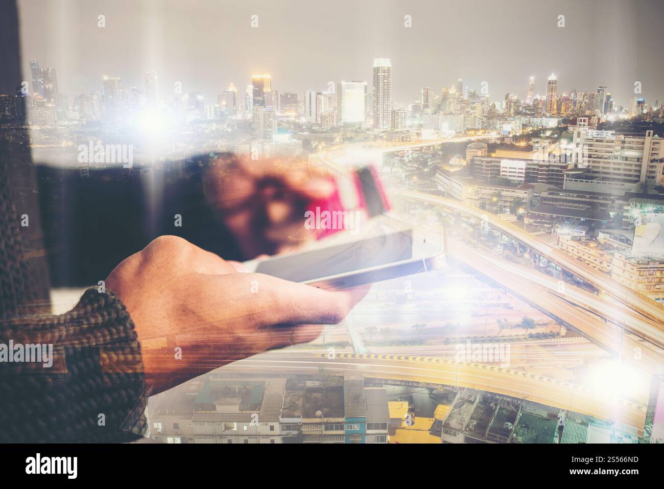 Young businessman using mobile phone shopping online with credit card ...