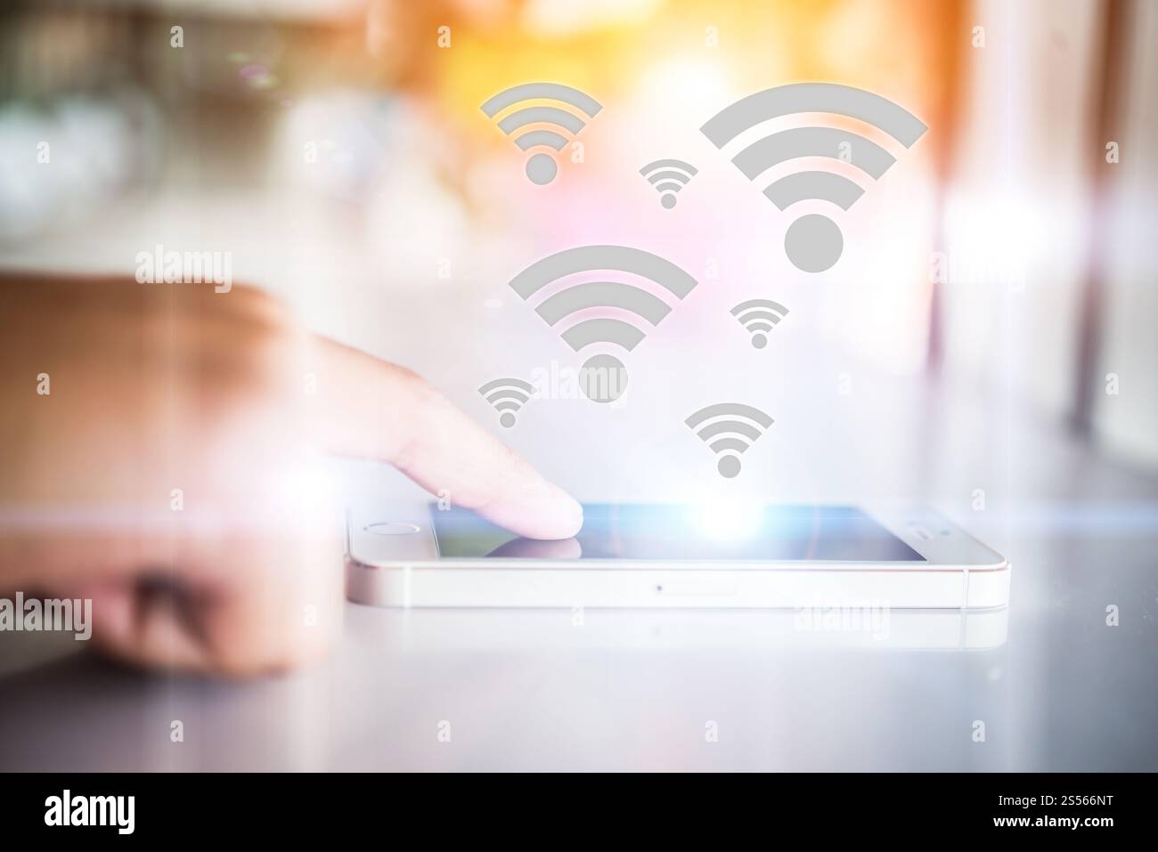 Woman touching wifi signal hi-res stock photography and images - Alamy